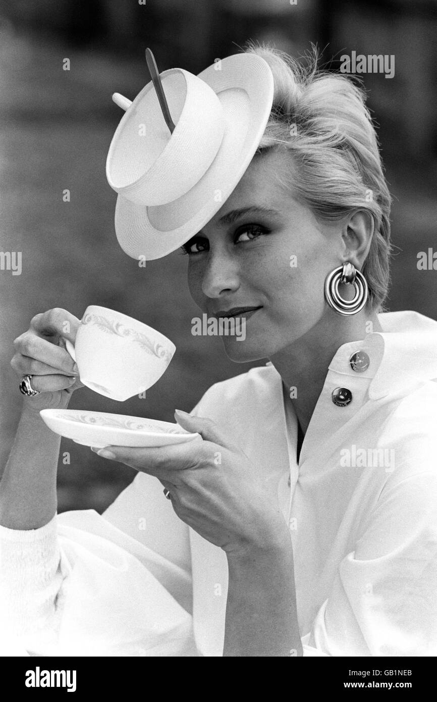 Model Alexandra Montenegro takes a break from the hat show to ...