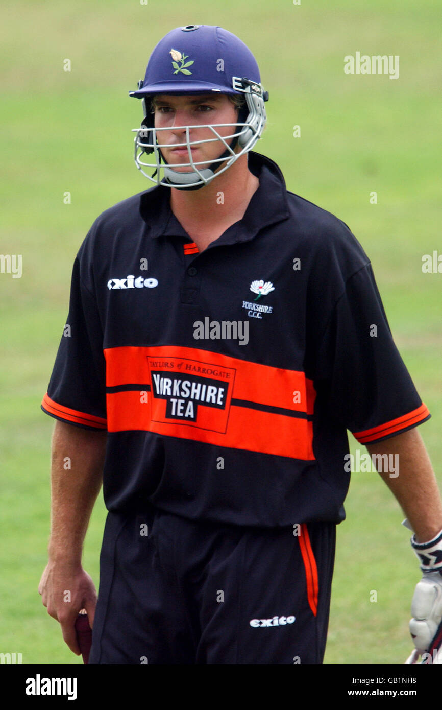 Yorkshire's Michael Lumb walks from the pitch after losing his wicket ...