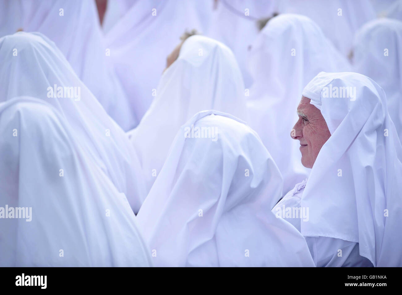 A man dressed in druid style robes looks on at the National ceremony ...