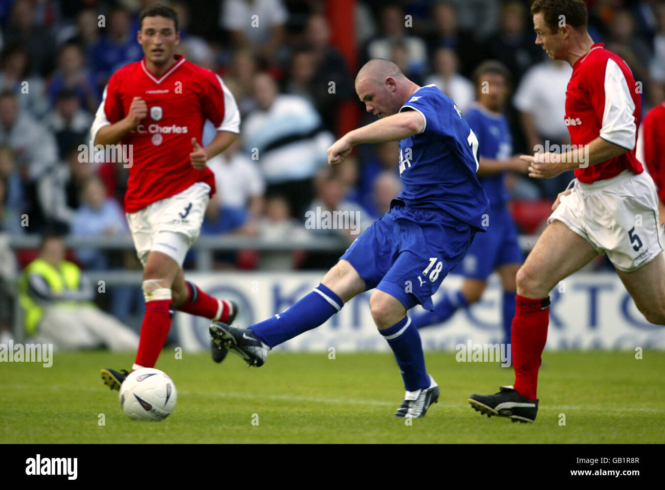 Evertons wayne gets between crewe alexandras chris mccready adie moses ...