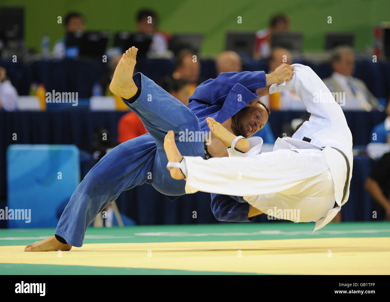Canada's Keith Morgan (blue) in action against Dominican Republic's ...