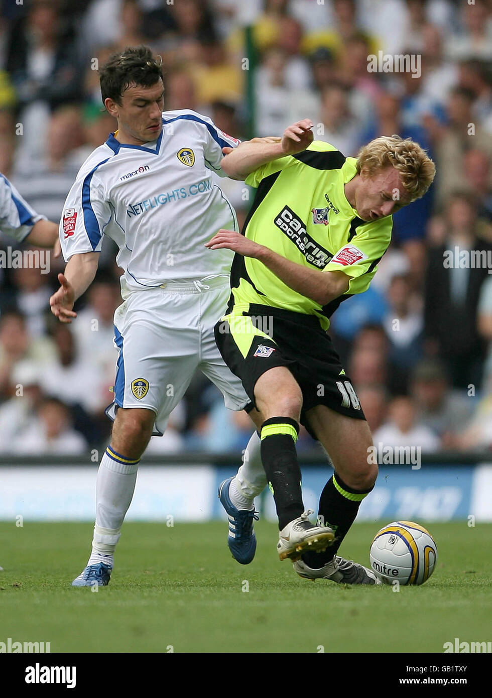 Leeds United's Robert Snodgrass and Oldham Athletic's Chris Taylor in ...