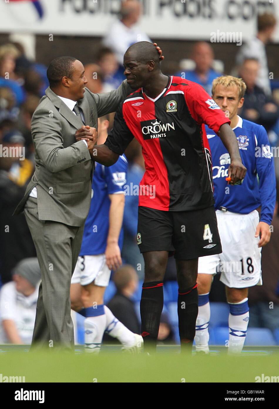 Blackburn Rovers' manager Paul Ince celebrates with Christopher Samba ...