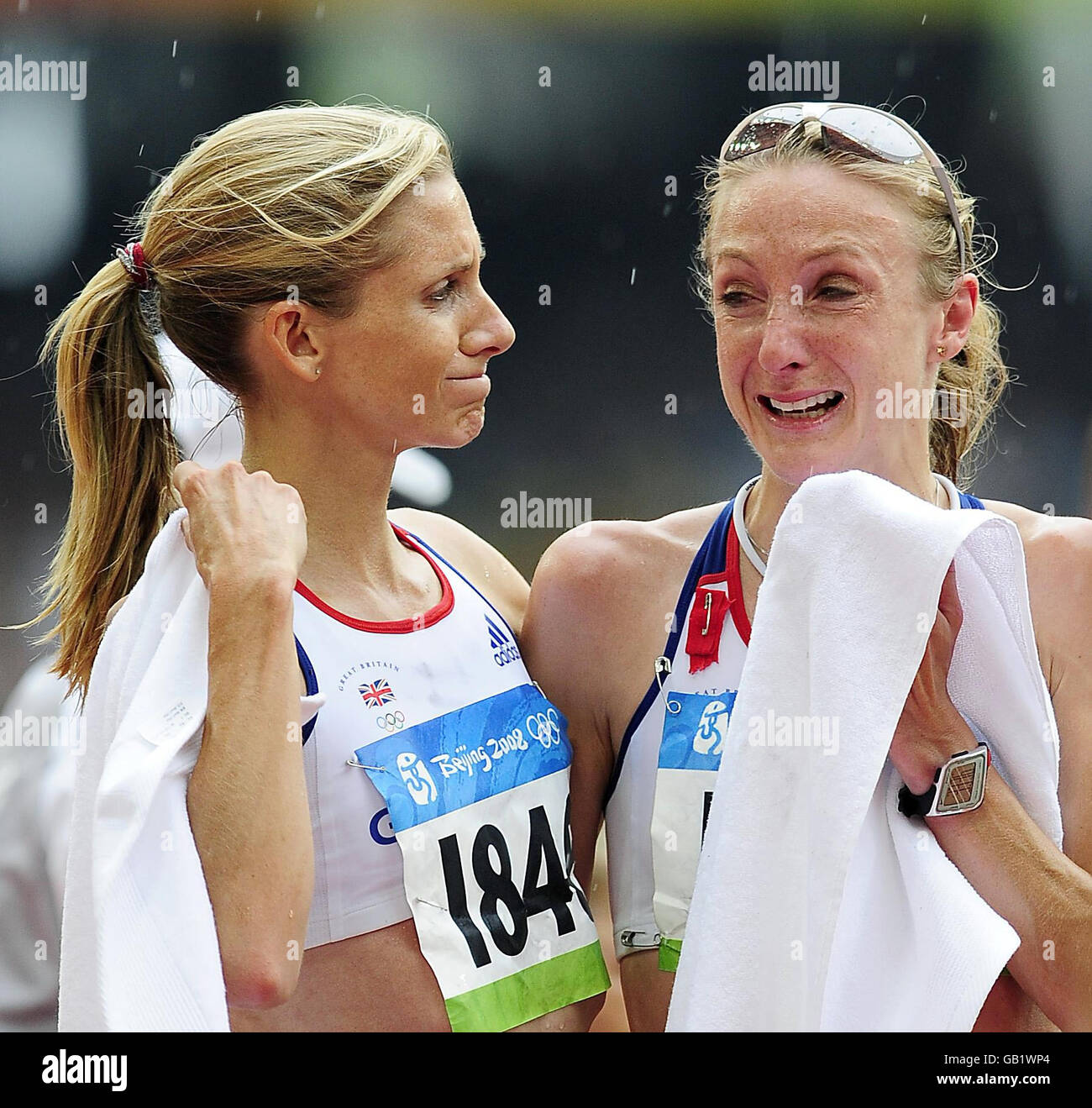 Great Britain's Paula Radcliffe is consoled by compatriot Liz Yelling ...