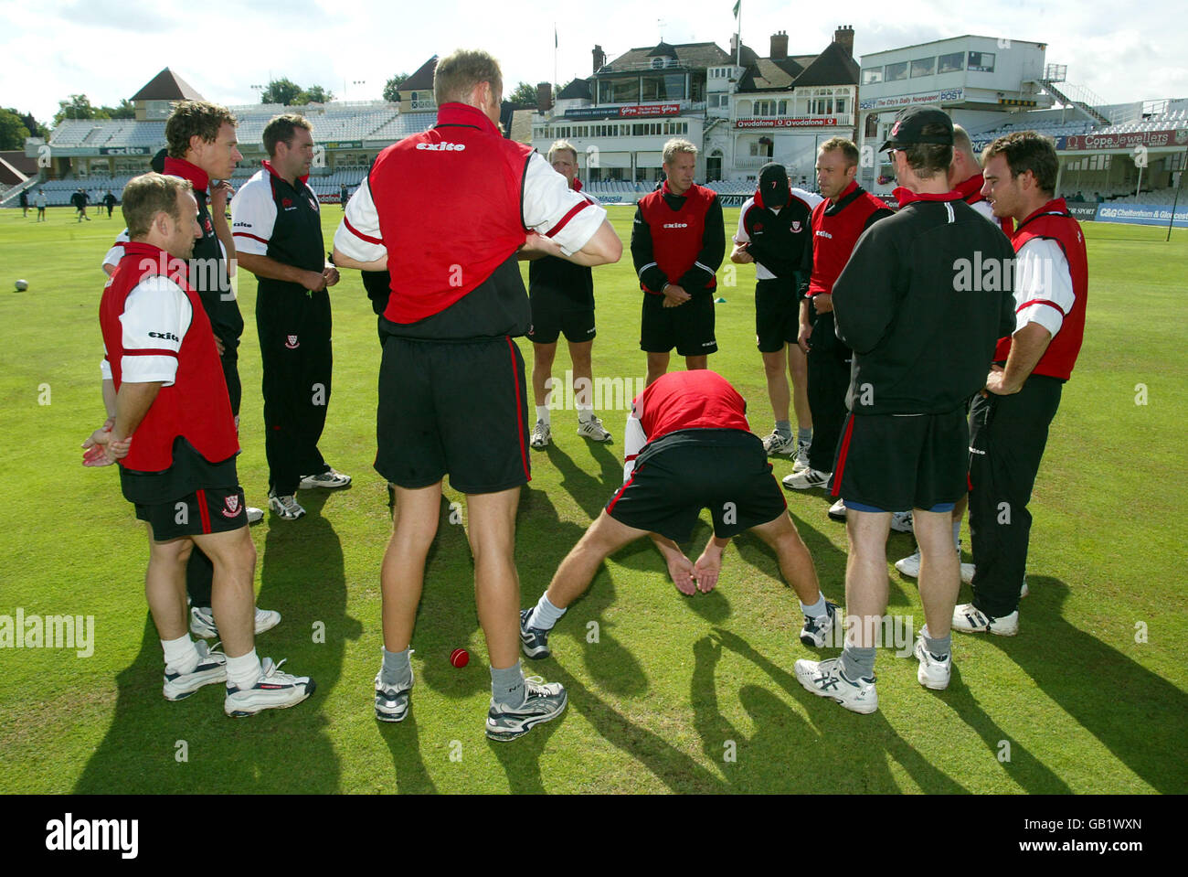 Sussex's coach Peter Moore gathers the players together prior to their ...