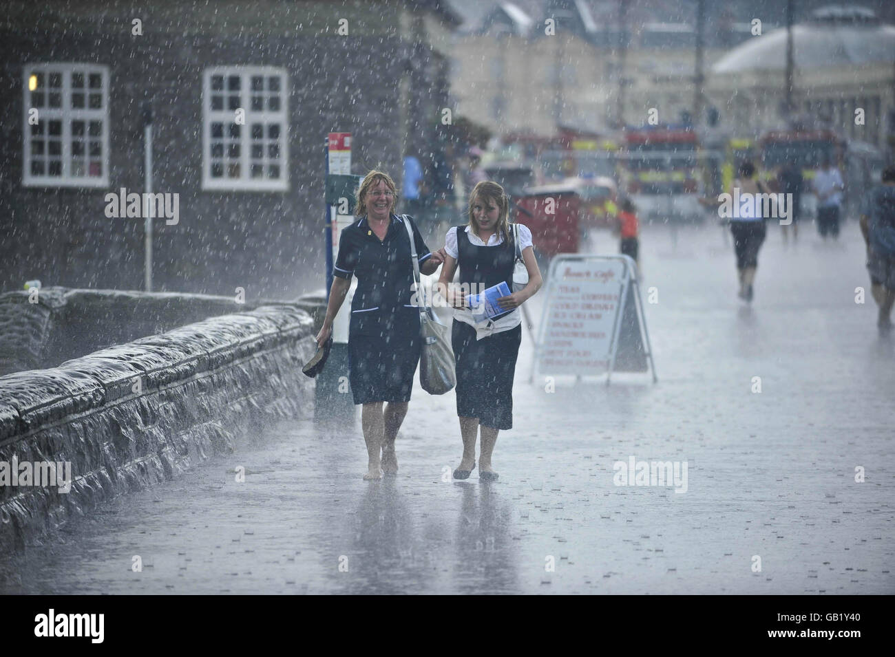 Woman Caught In Rain High Resolution Stock Photography and Images - Alamy