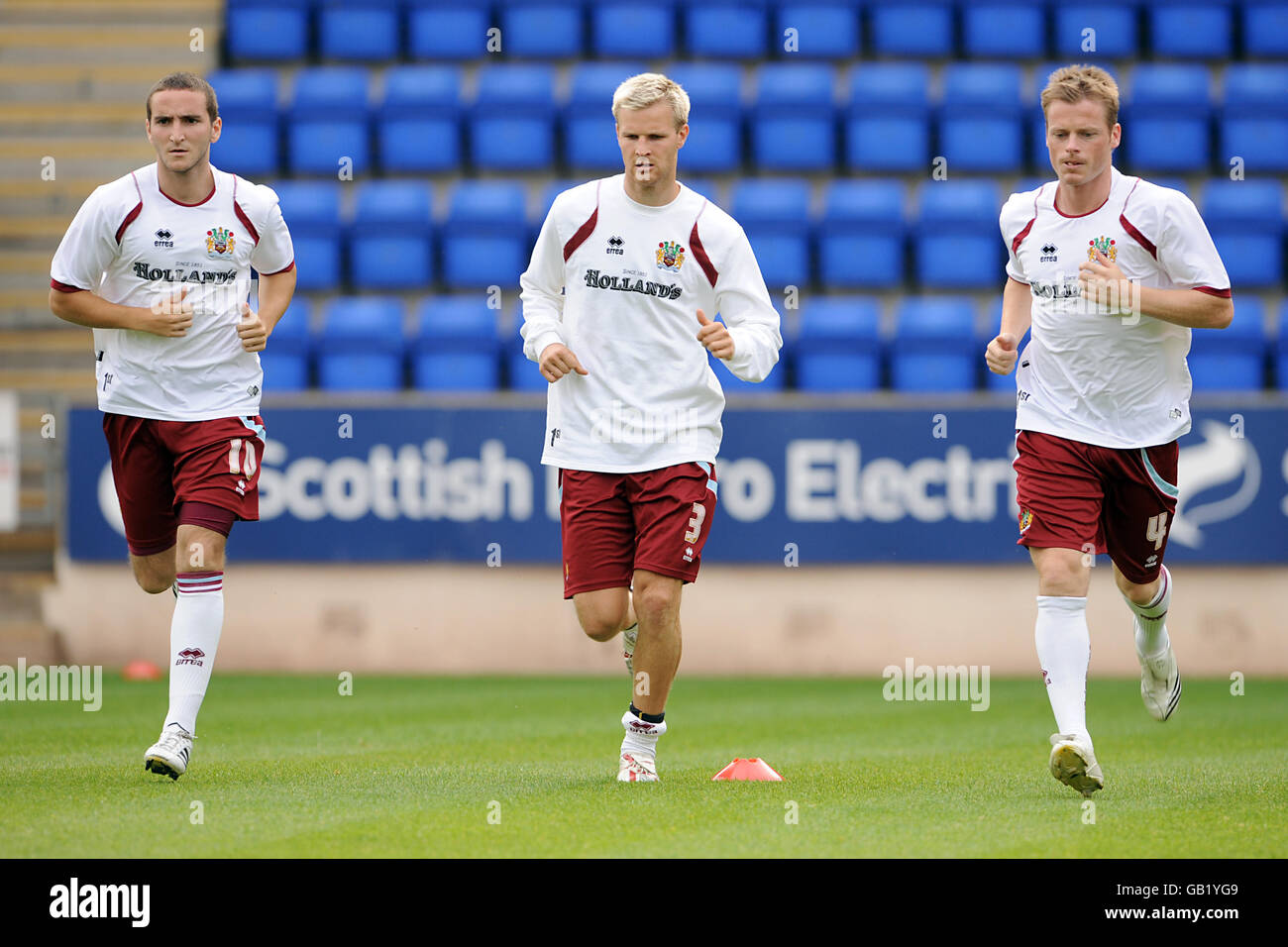 (l-r) Burnley's Martin Paterson, Christian Kalvenes and Alan Mahon warm ...