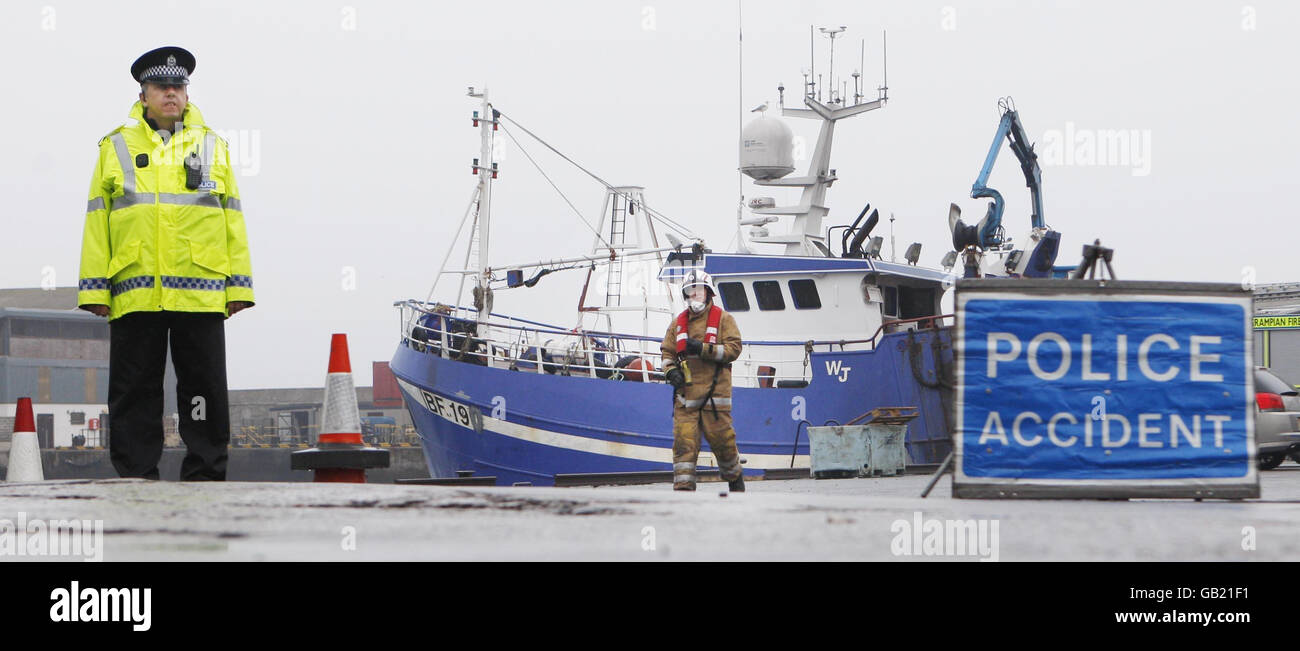Fire on fishing boat Stock Photo - Alamy