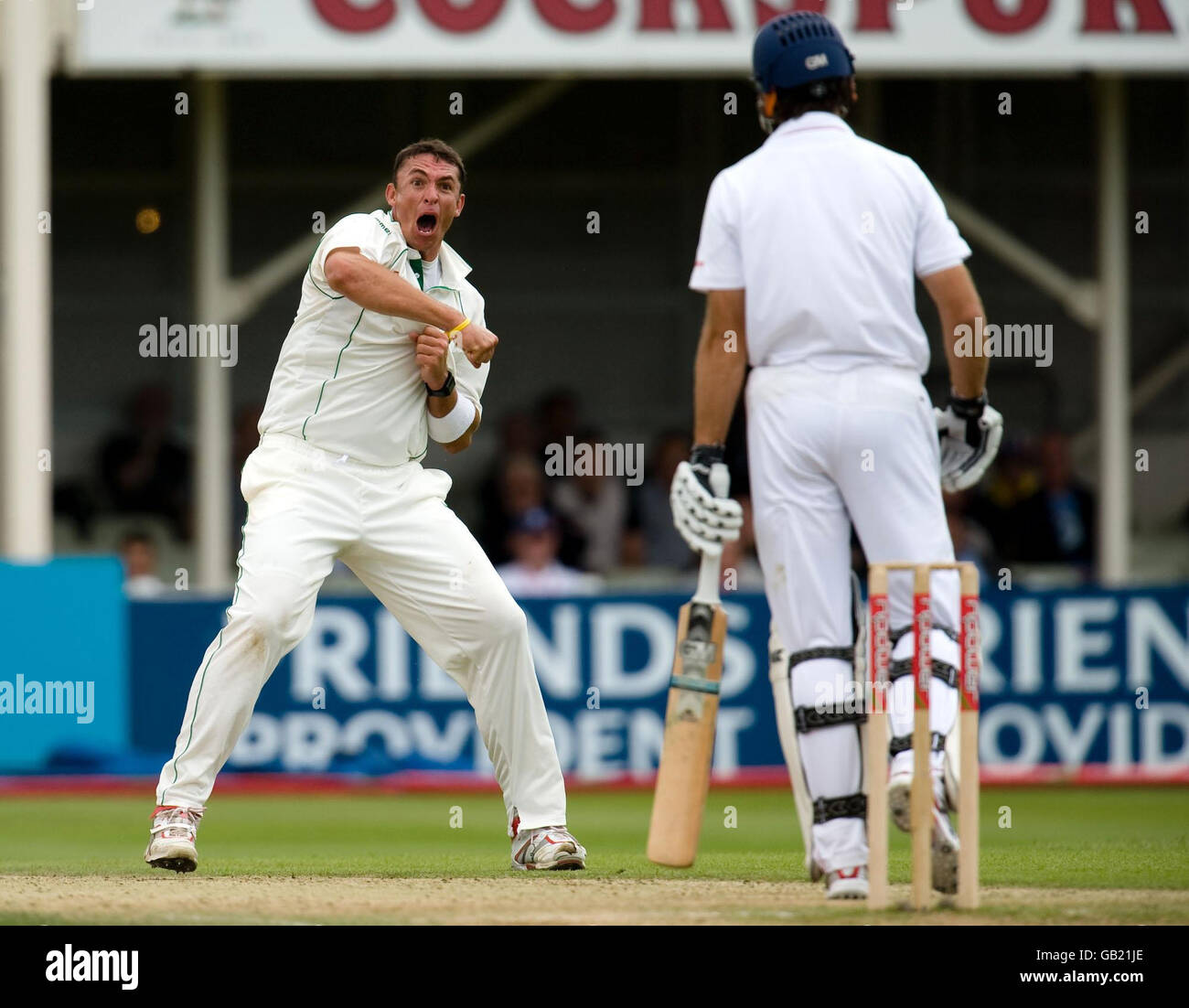 South Africa's Andre Nel celebrates dismissing England captain Michael ...