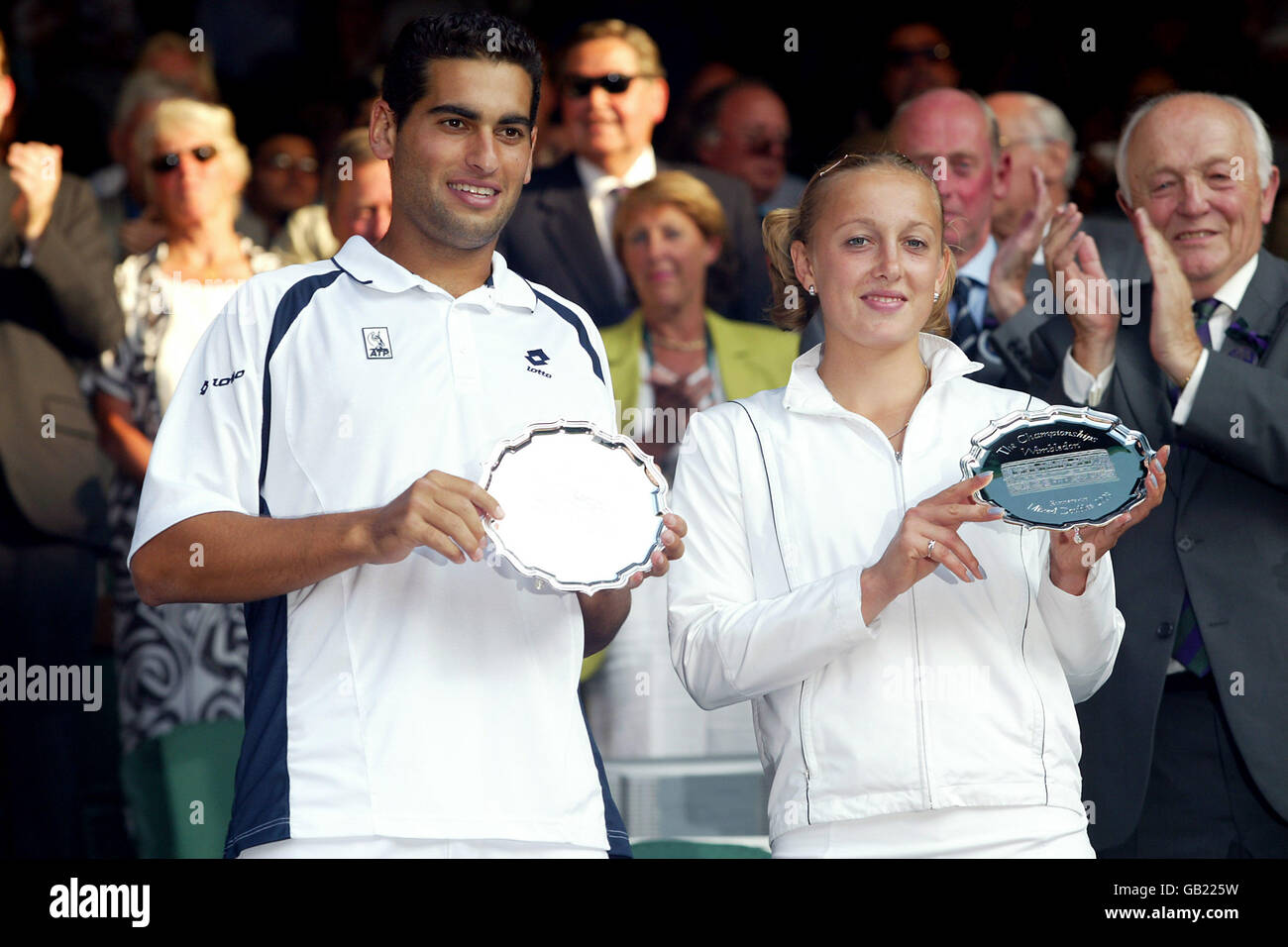 L r andy ram anastassia rodionova receive their runners up trophies hi ...