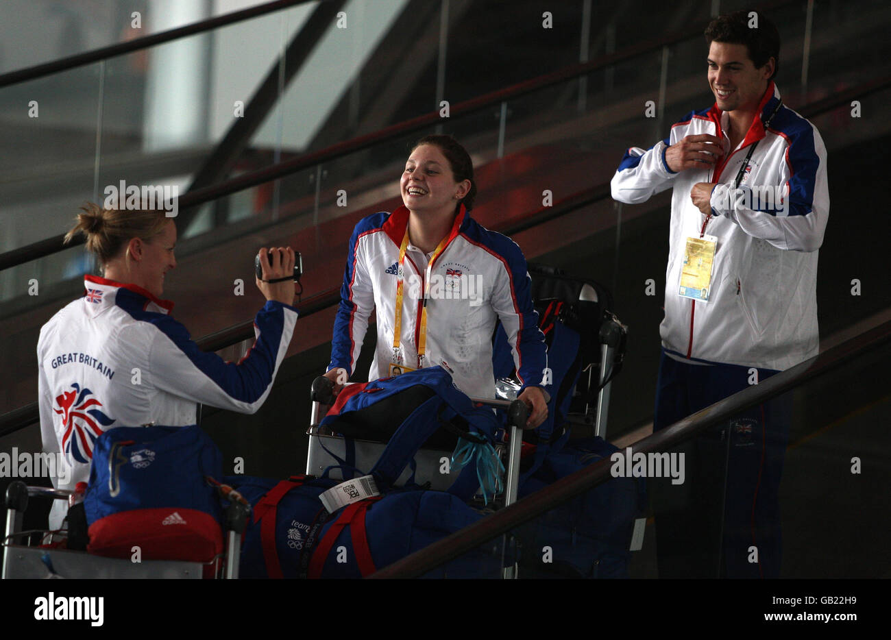 Great Britain Swimmer Ellen Gandy (centre) arrives at Beijing airport ...