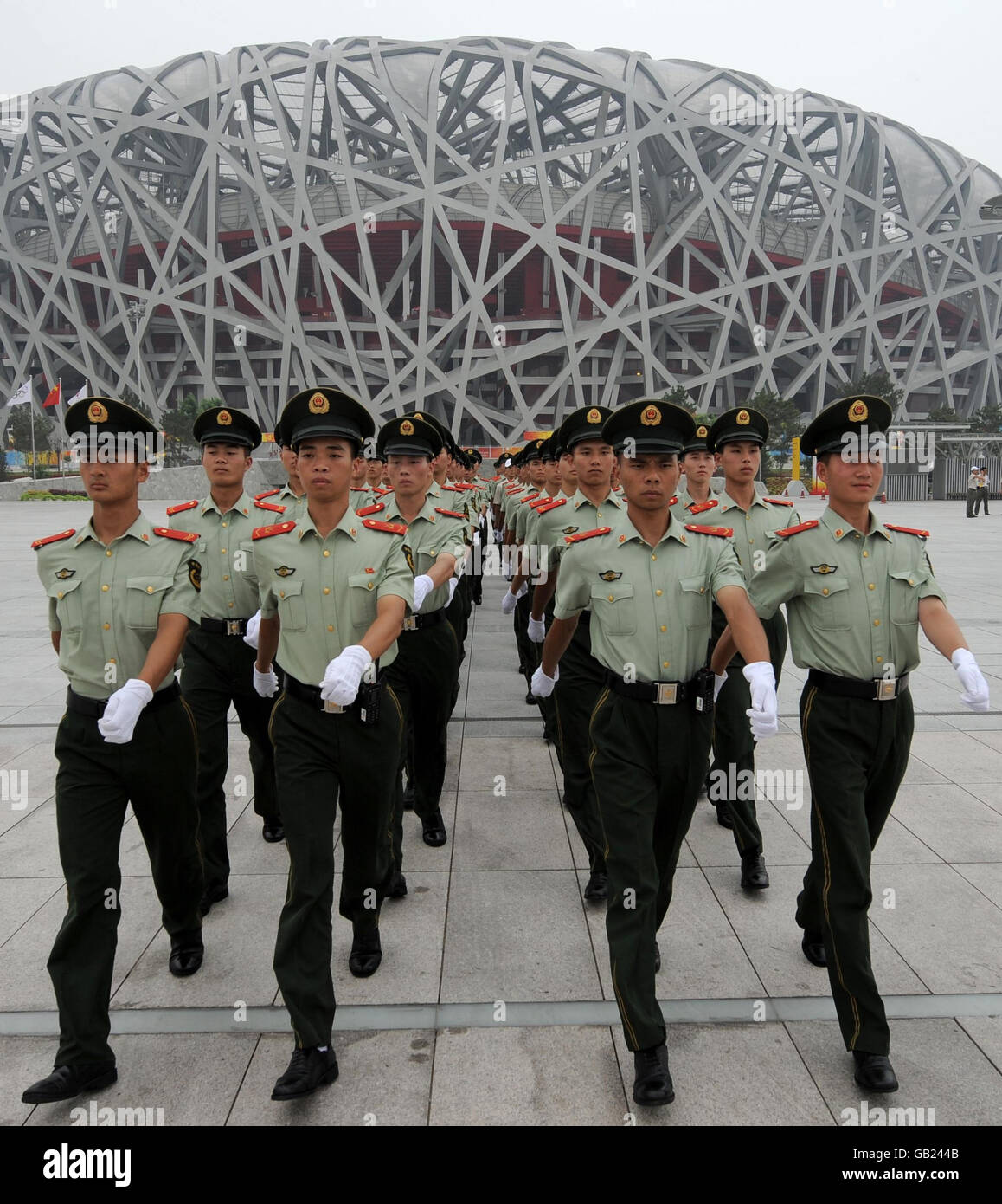 Security guards march outside olympic national stadium hi-res stock ...