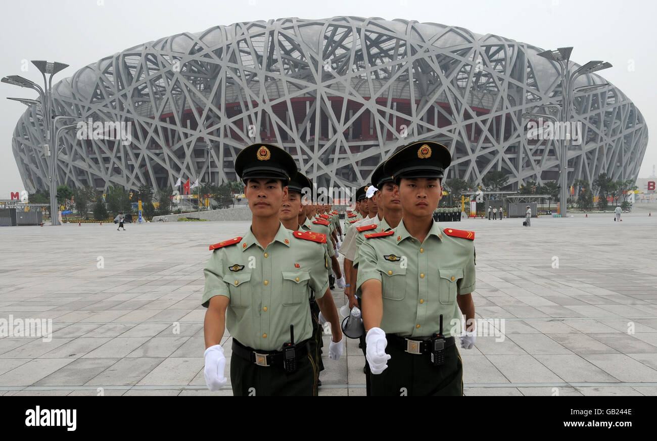 Security guards march outside olympic national stadium hi-res stock ...
