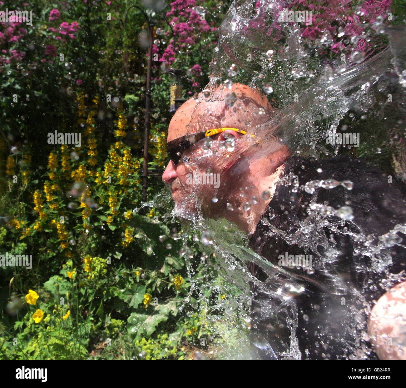 Burst of water in face hi-res stock photography and images - Alamy
