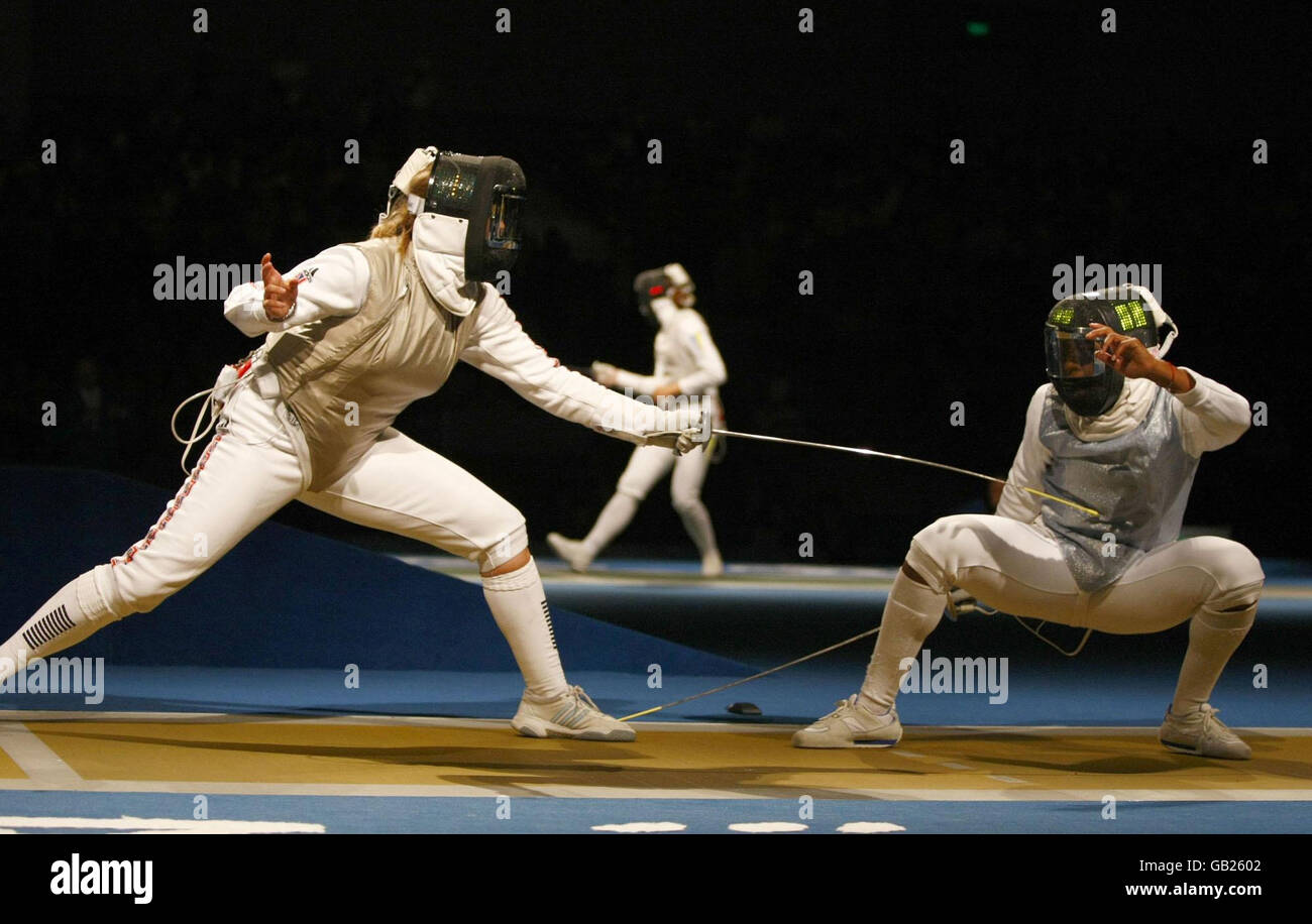 Great Britain's Martina Emanuel (left) in action during her match with ...