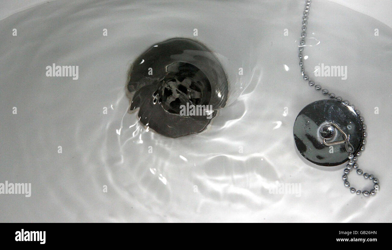 Down the plughole hi-res stock photography and images - Alamy