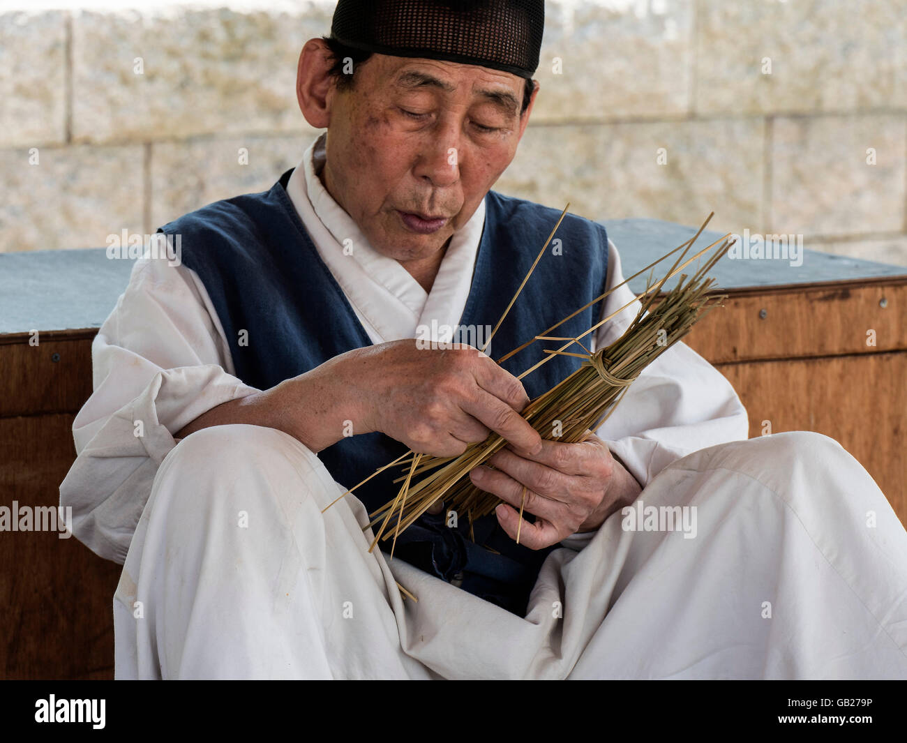 traditional straw plaiting in Namsangol Hanok village, Seoul, South ...