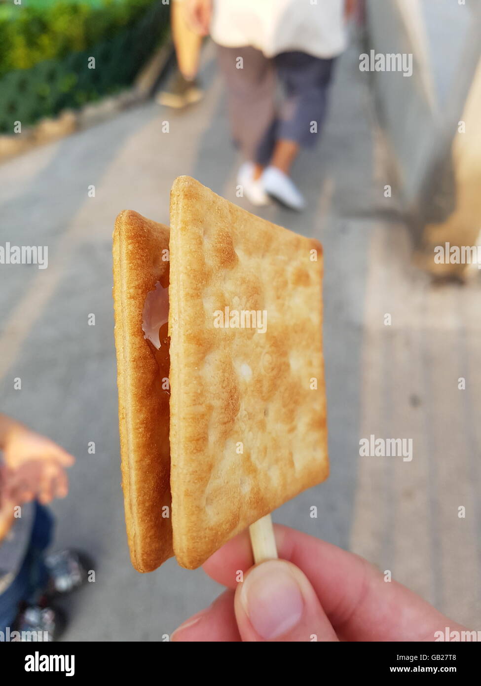 Maltose Cracker on stick Stock Photo - Alamy