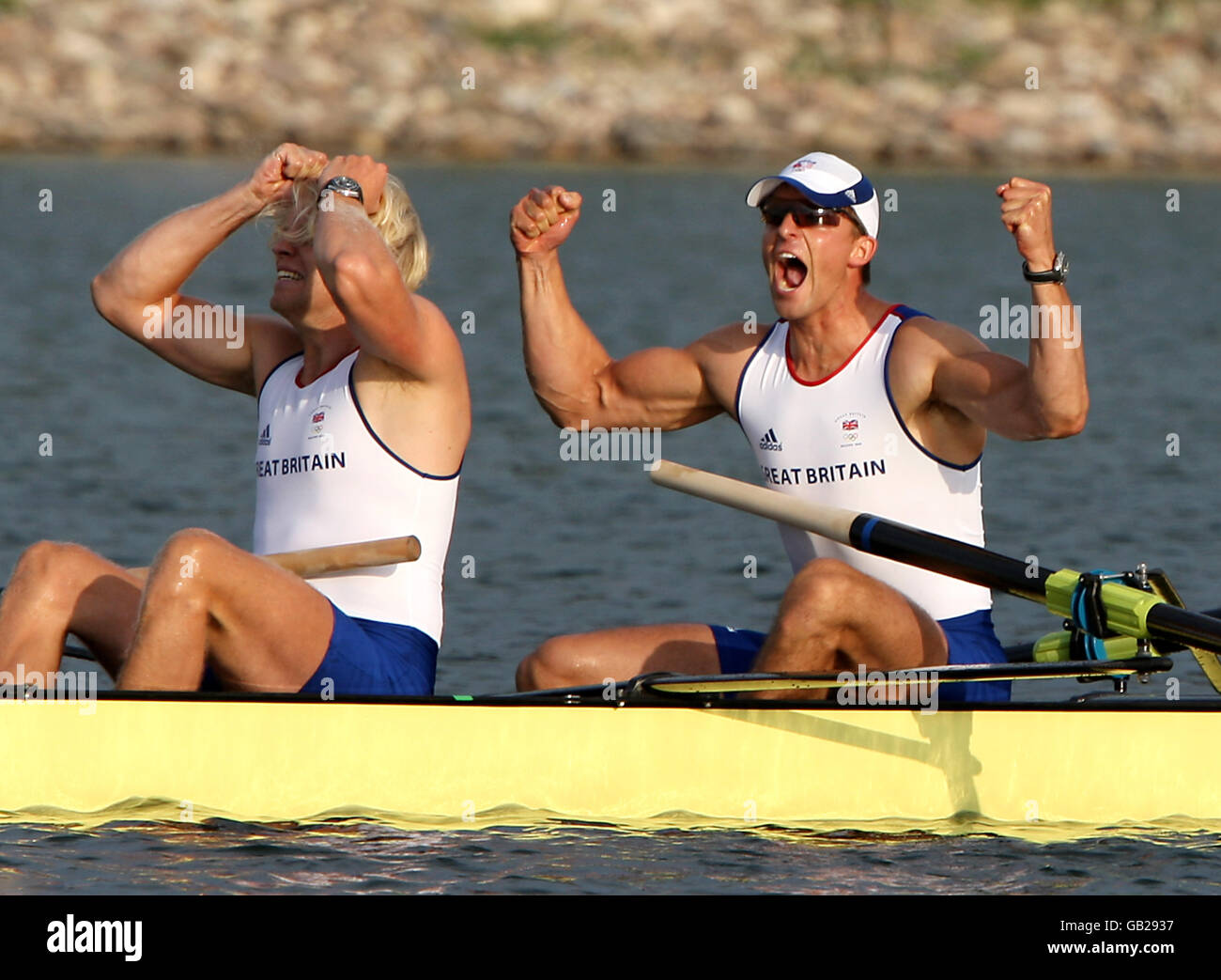 Great Britain's rowers Andrew Triggs Hodge (left) and Pete Reed react ...
