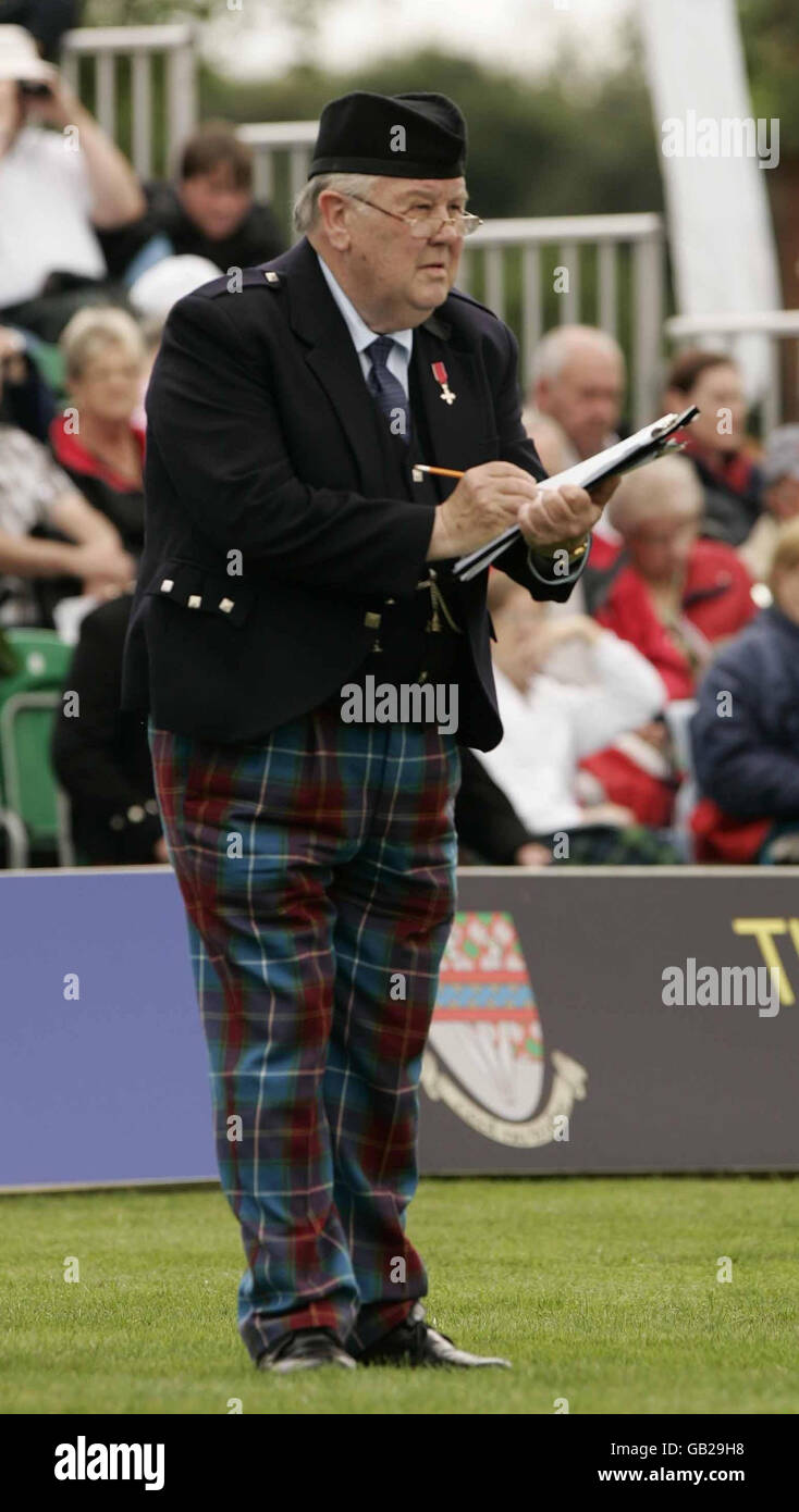 A judge scores pipers in the World Pipe Band Championships in Glasgow ...