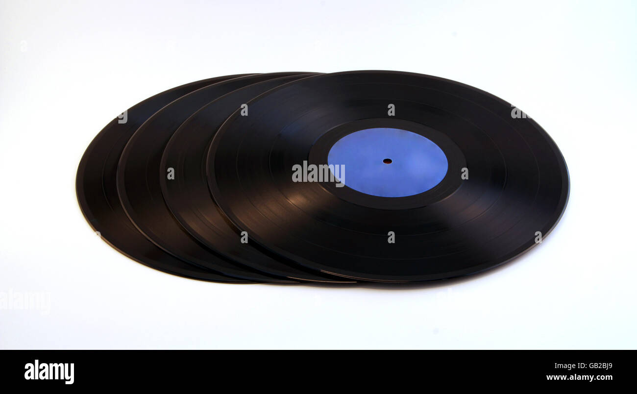 a pile of black vinyl with white background Stock Photo - Alamy