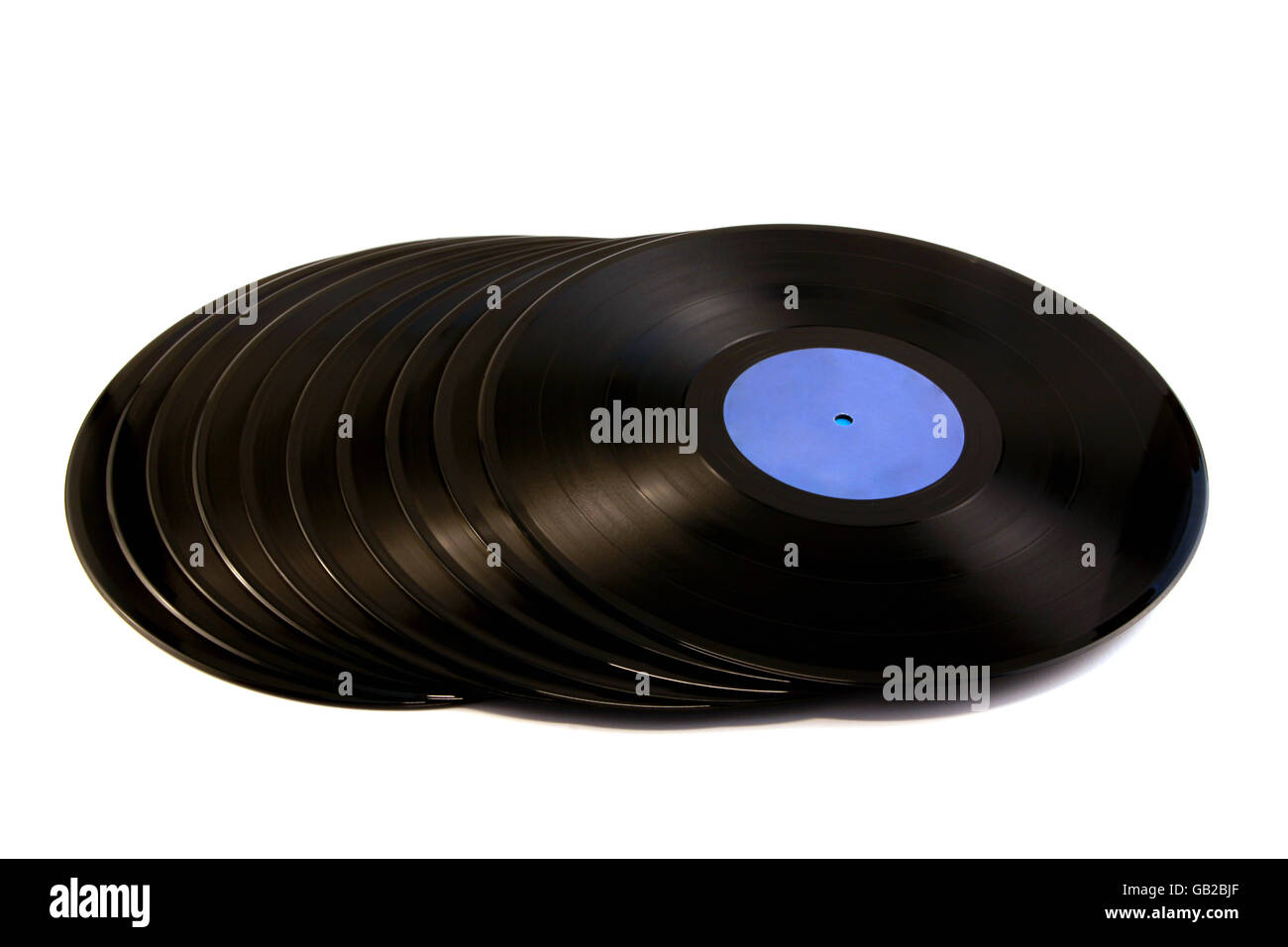 a pile of black vinyl with white background Stock Photo - Alamy
