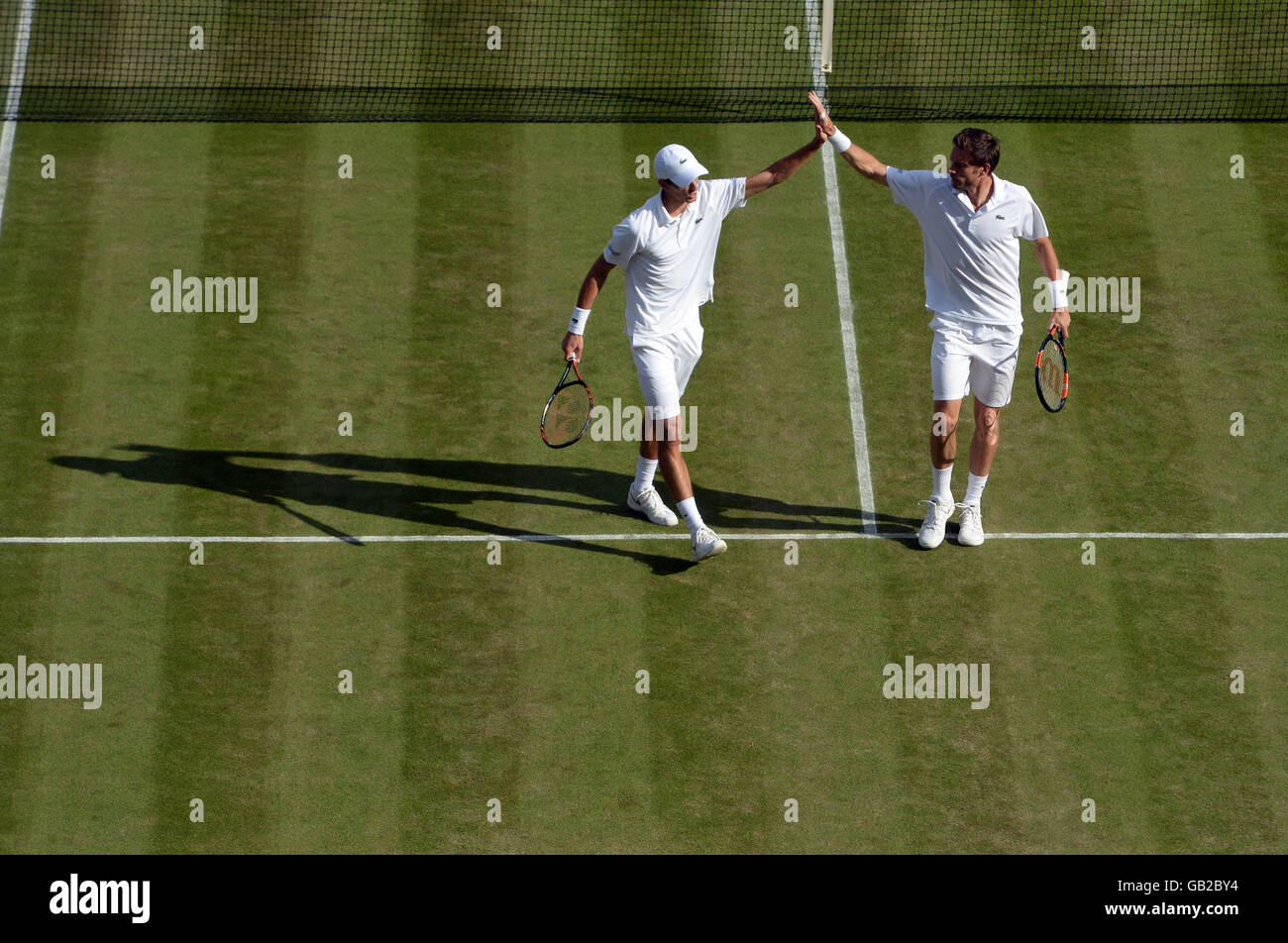 Pierre-Hugues Herbert and Nicolas Mahut (top) take on Sam Groth and ...