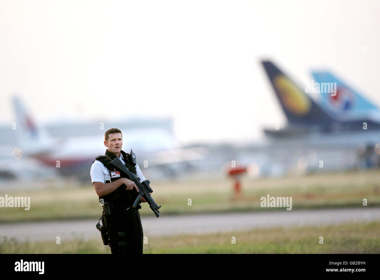 Police officers patrol near the Royal Suite at Heathrow Airport Stock ...
