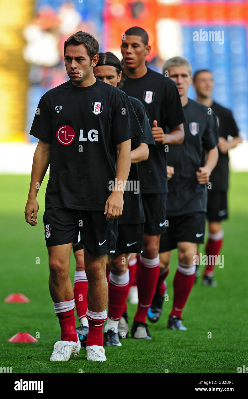 Fulhams lee cook left during pre match training hi-res stock ...