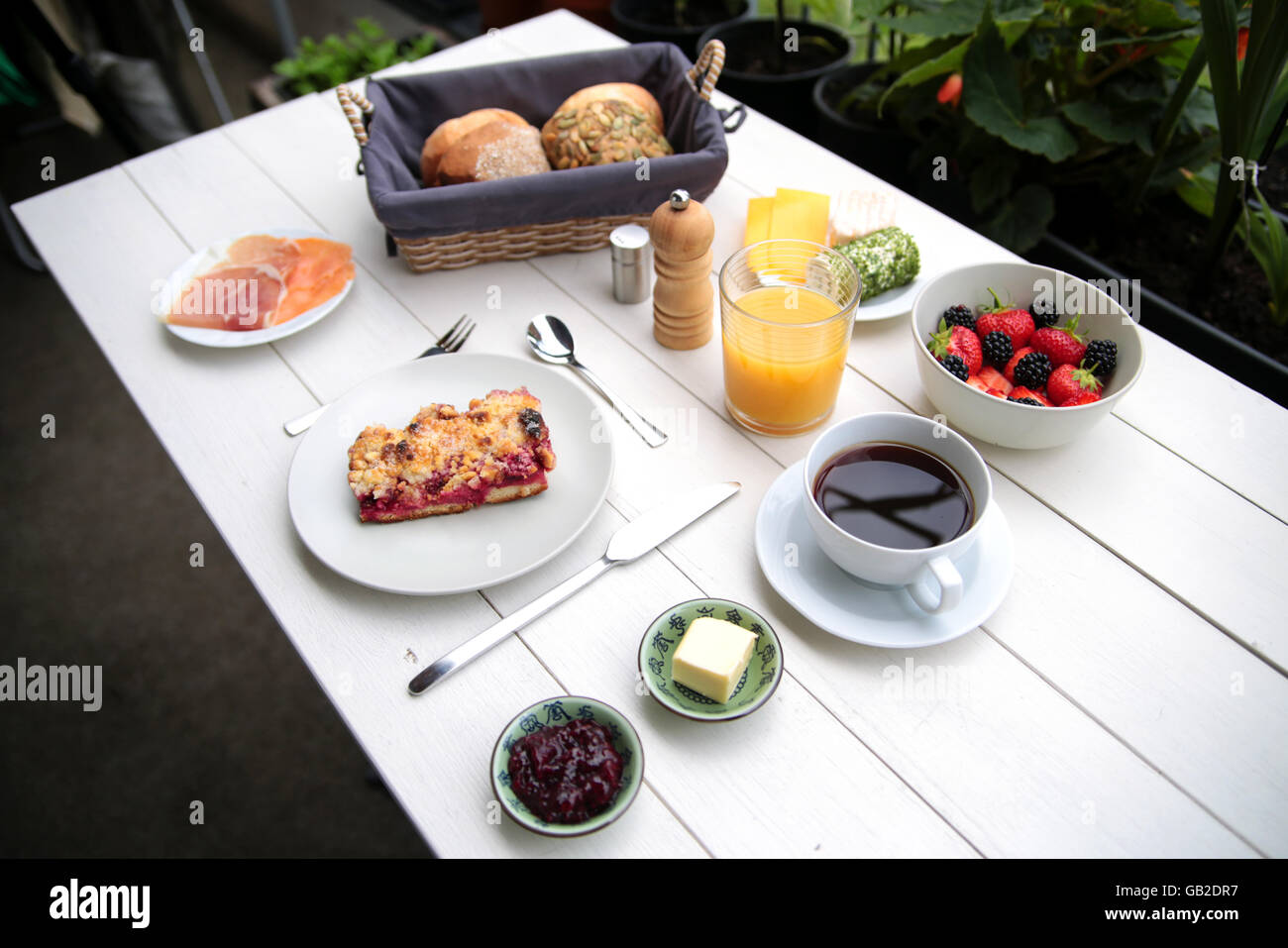 delicate breakfast at a white table with different ingredients Stock ...