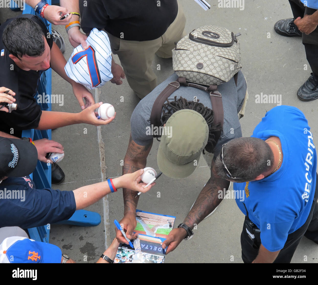 Baseball player signing baseball hi-res stock photography and images ...