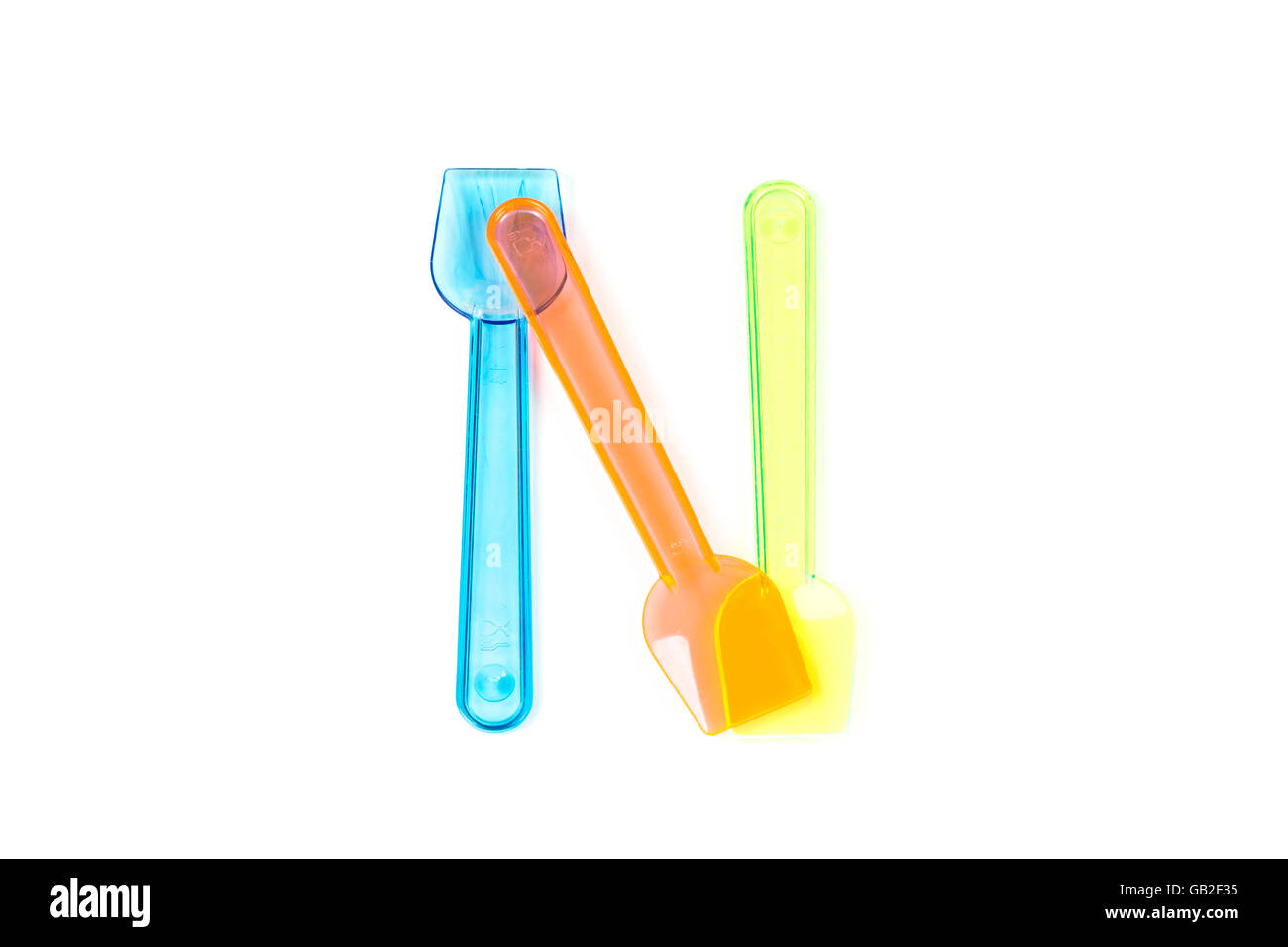 N letter with ice cream spoons Stock Photo - Alamy