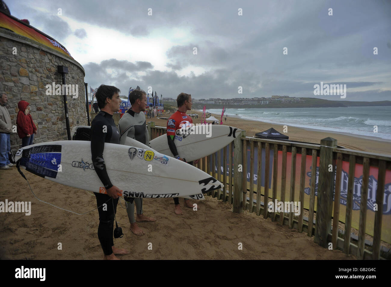 Surfers check out the conditions on Fistral beach, Newquay at the week ...
