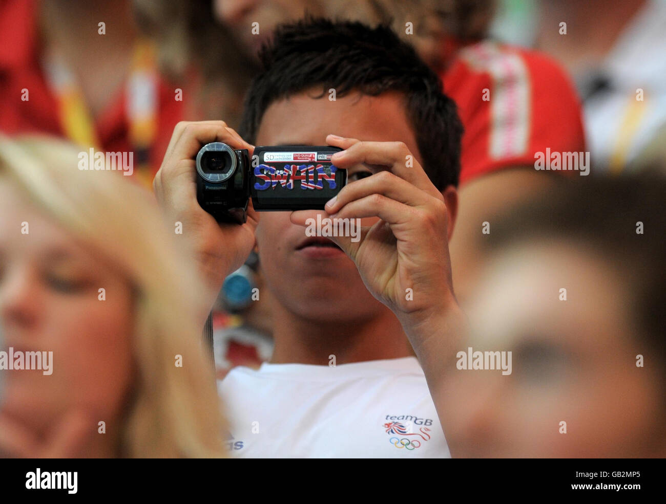 Great Britain's Tom Daley films team mates Benjamin Swain and Nicholas ...