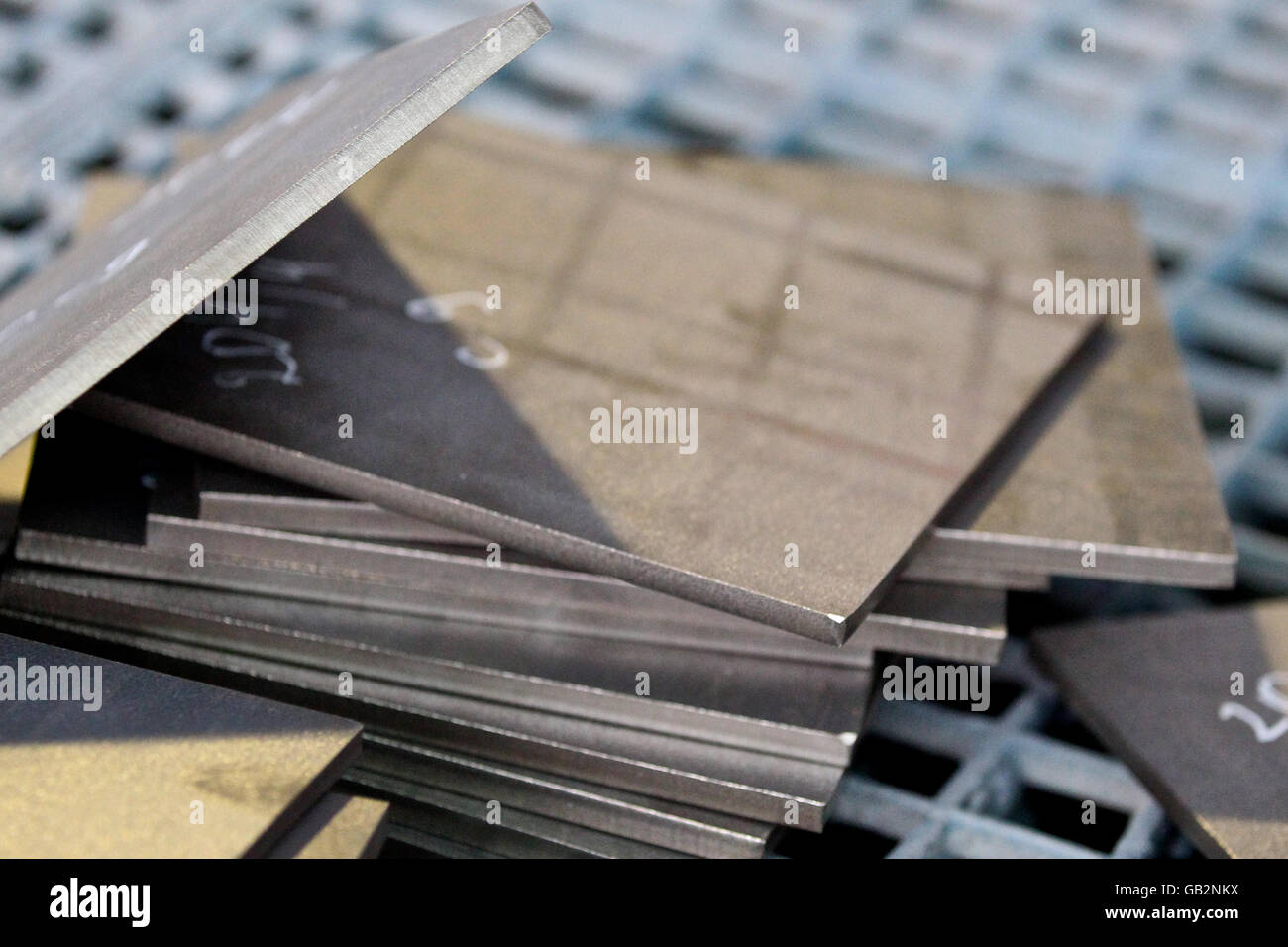 square polished metal plate segments for further processing Stock Photo ...