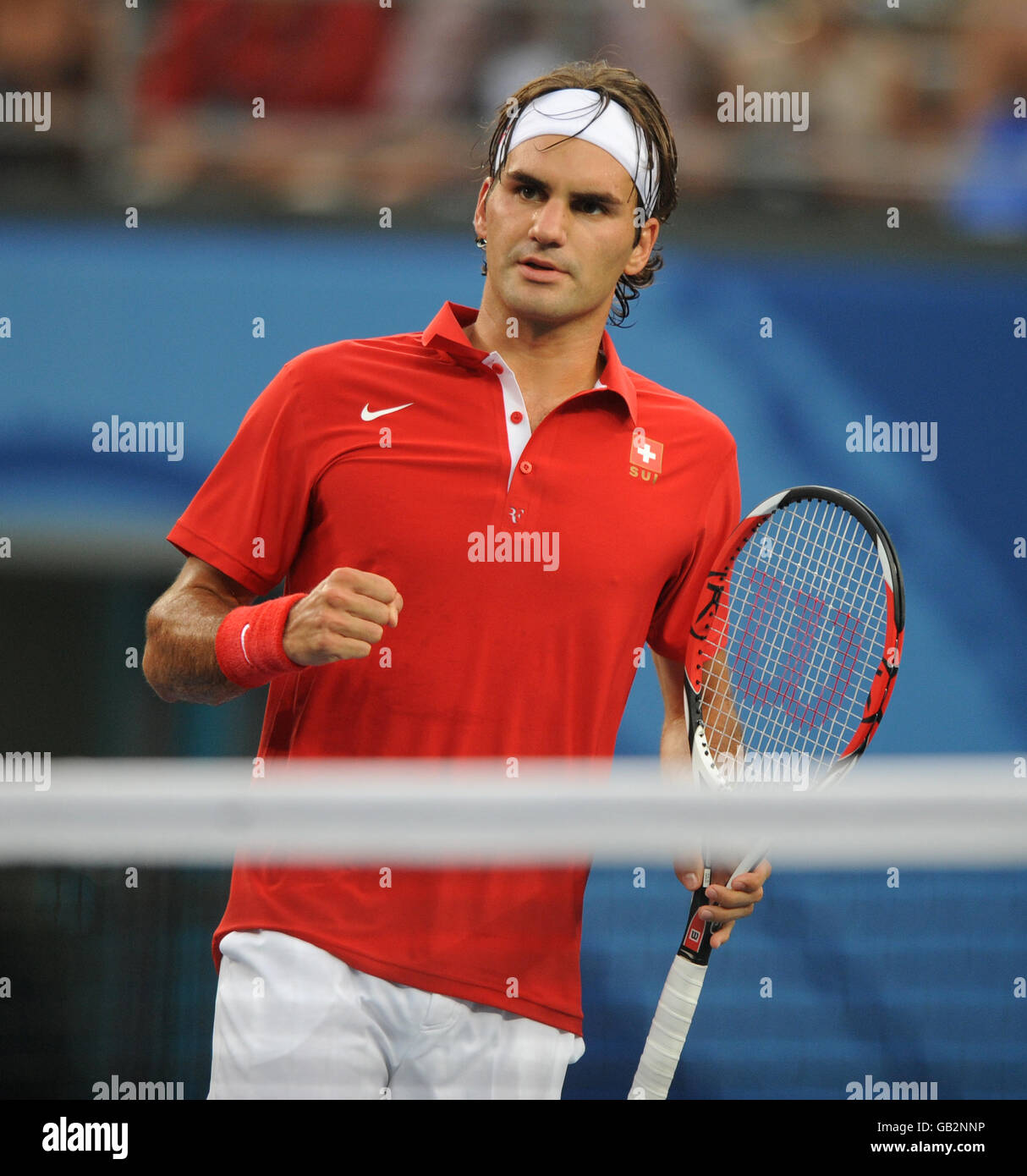 Switzerland's Roger Federer celebrates winning a point against Czech ...