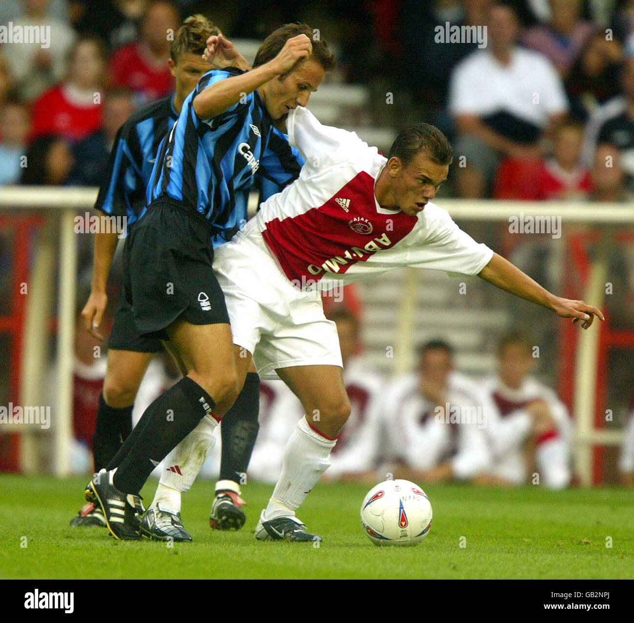 Nottingham Forest's Eoin Jess battles with Ajax's Wesley Sneijder Stock ...