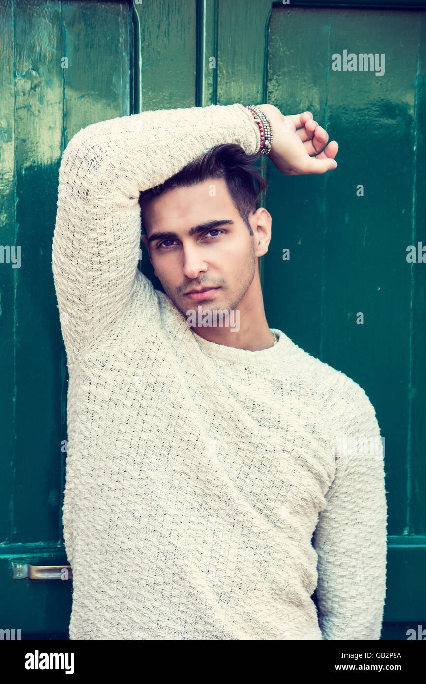 Man leaning against wall old hi-res stock photography and images - Alamy