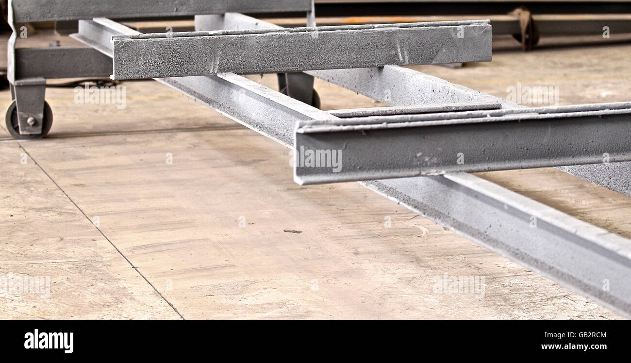 elements of transport trolleys for moving material in an industrial ...