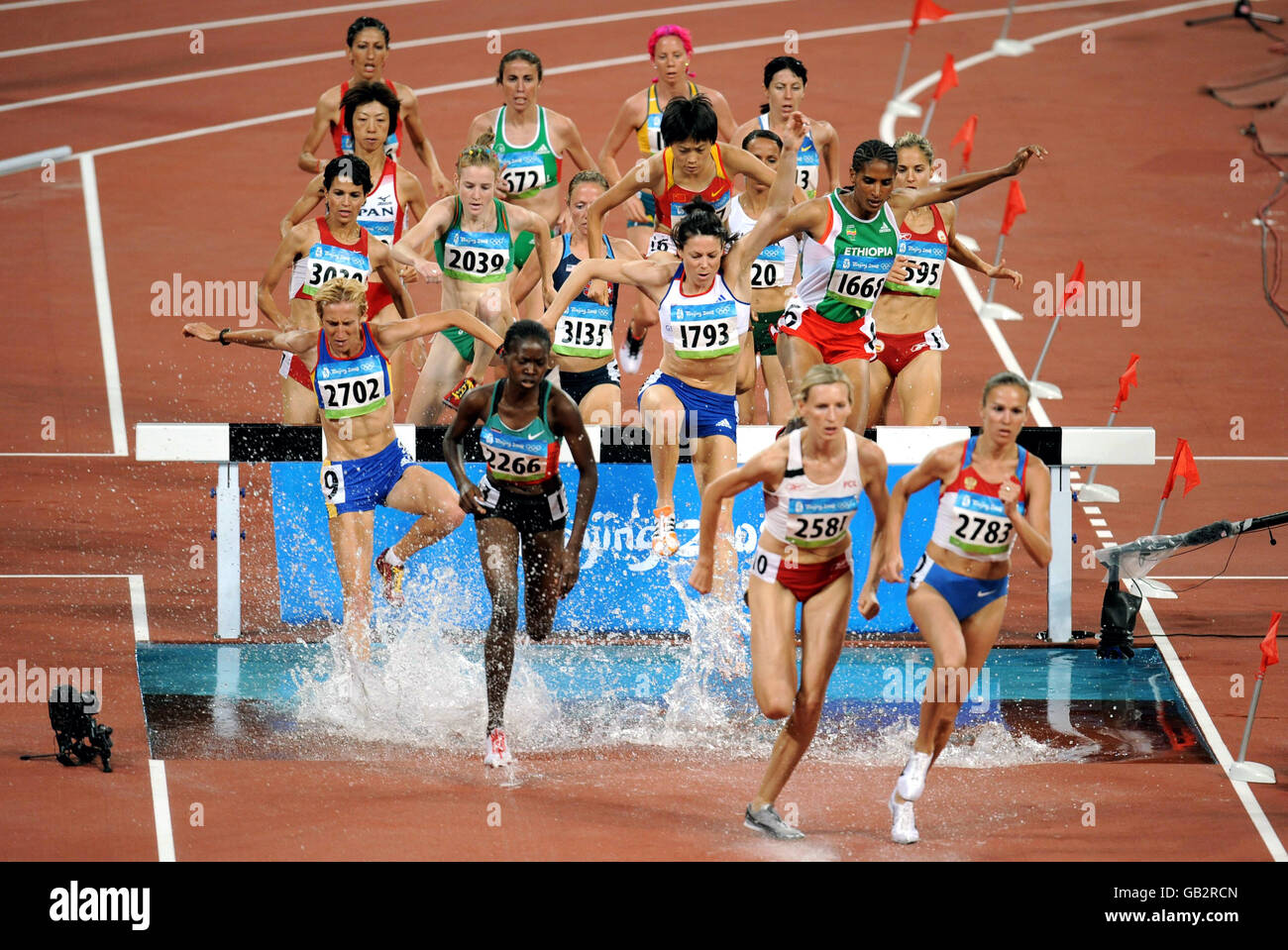 Great Britain's Helen Clitheroe (no.1793) jumps the water jump during ...