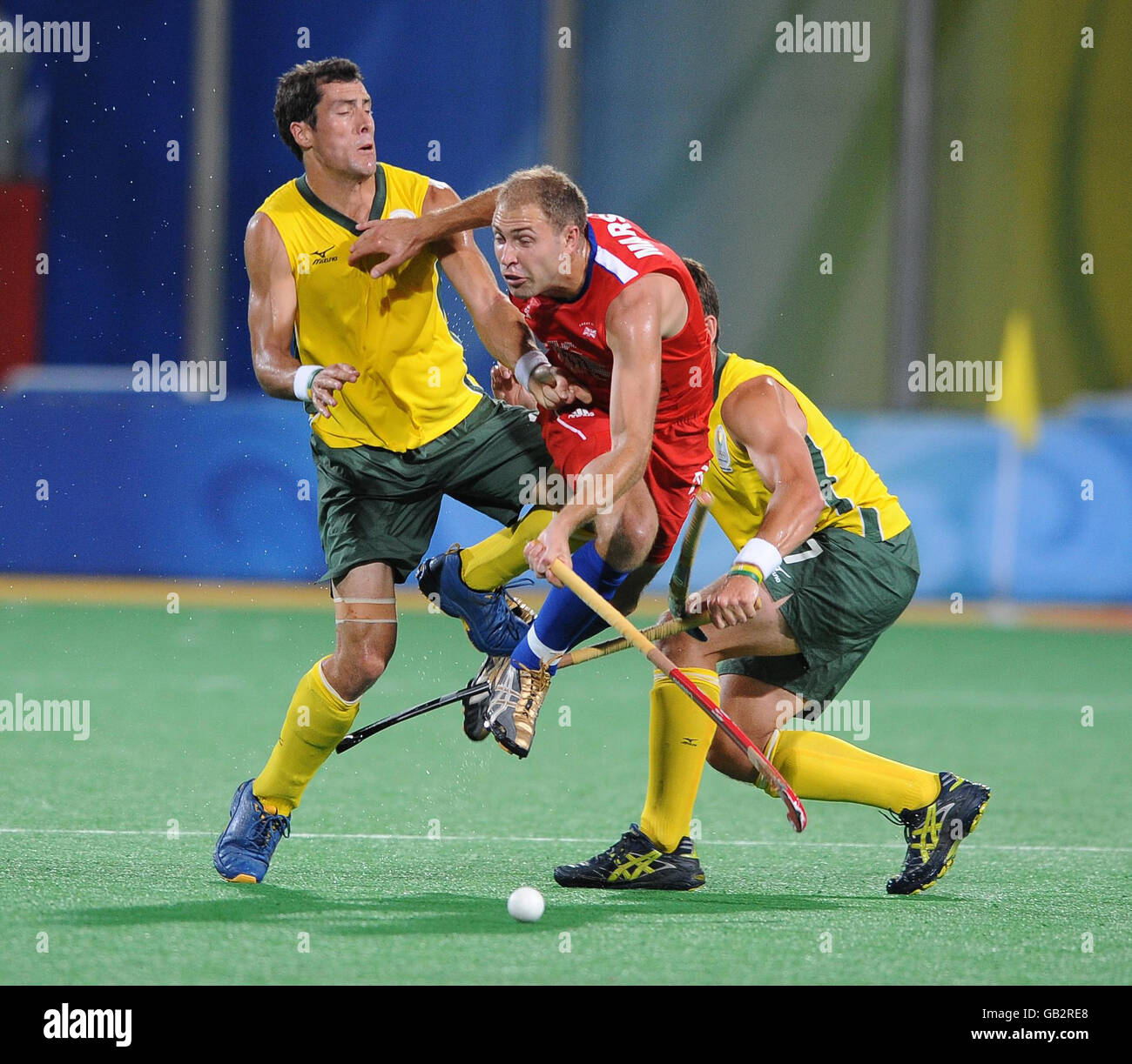 Great Britain's Ben Marsden is tackled by South Africa's Eric Rose ...
