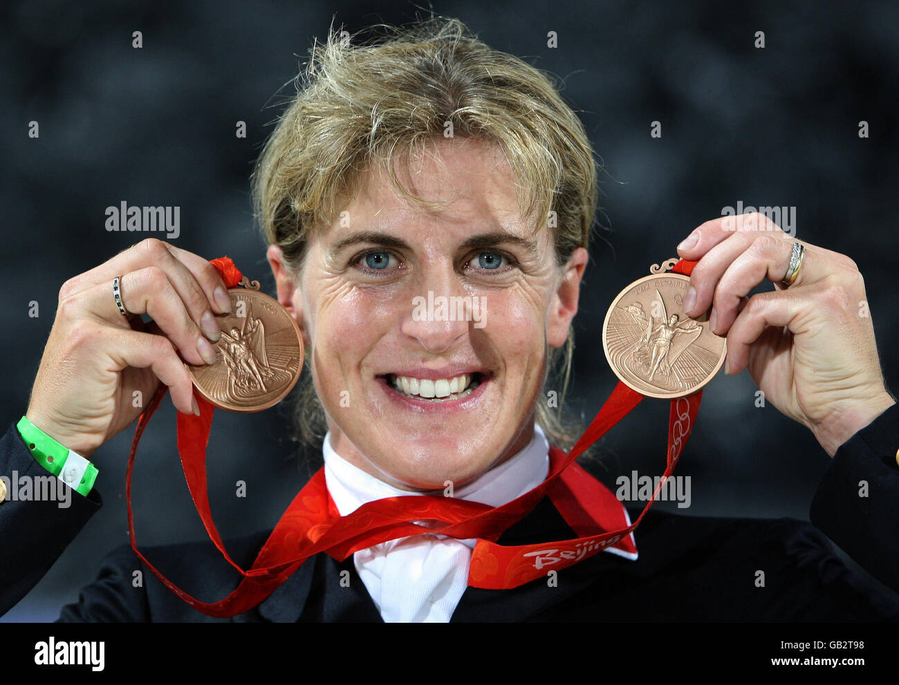 Great Britain's Tina Cook with the two bronze medals that she won ...