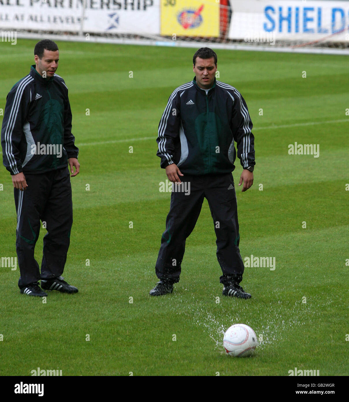 Referee does pitch inspection hi-res stock photography and images - Alamy