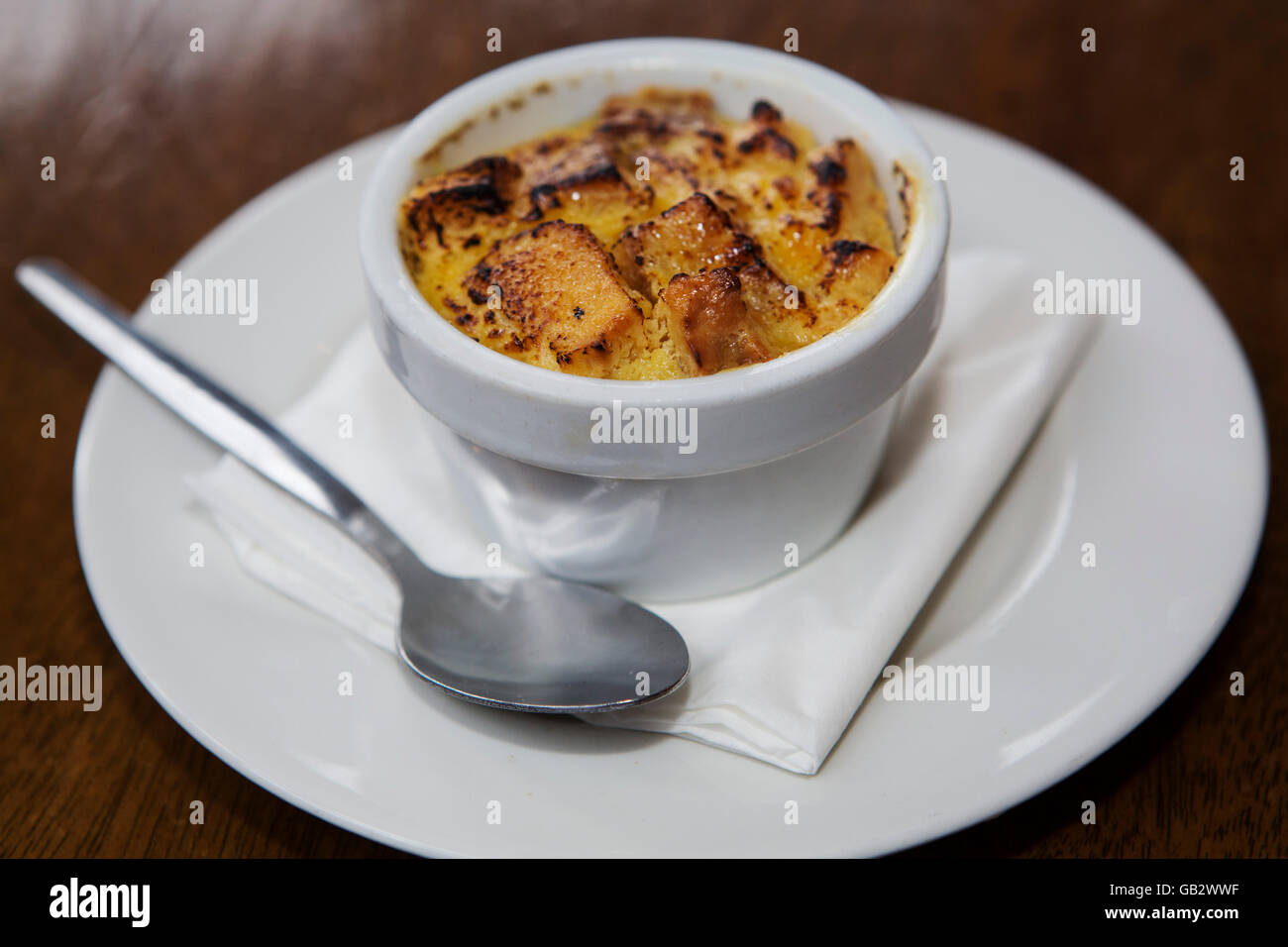 Bread and butter pudding served in London, England. The dessert is a ...