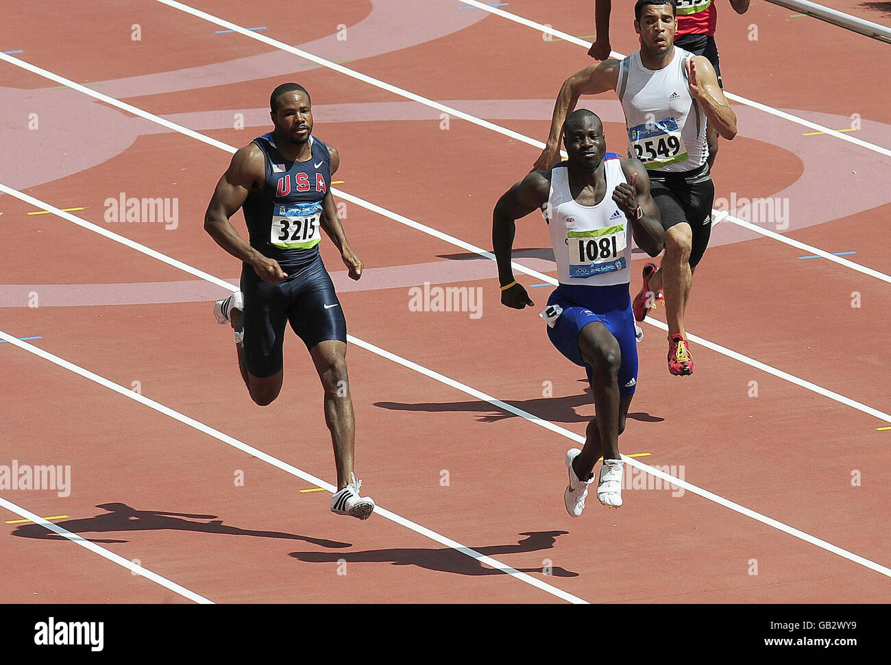 Male athletes running olympics hi-res stock photography and images - Alamy