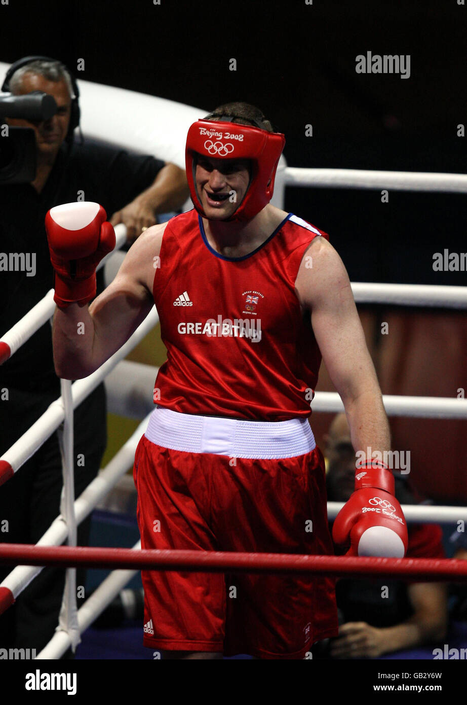 Great Britain's David Price celebrates his victory after his opponent ...
