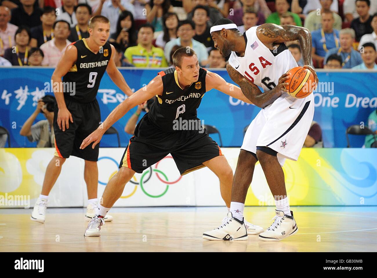 USA's Lebron James (right) and in action against Germany's Konrad ...