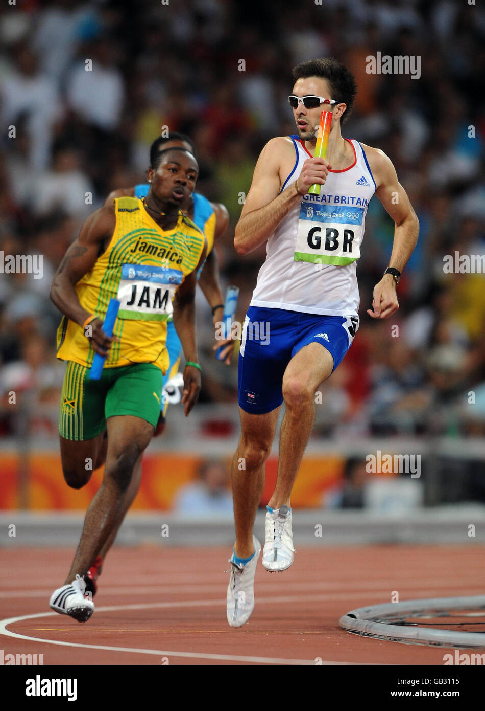Great Britain's Martyn Rooney looks over his shoulder at Jamaica's ...