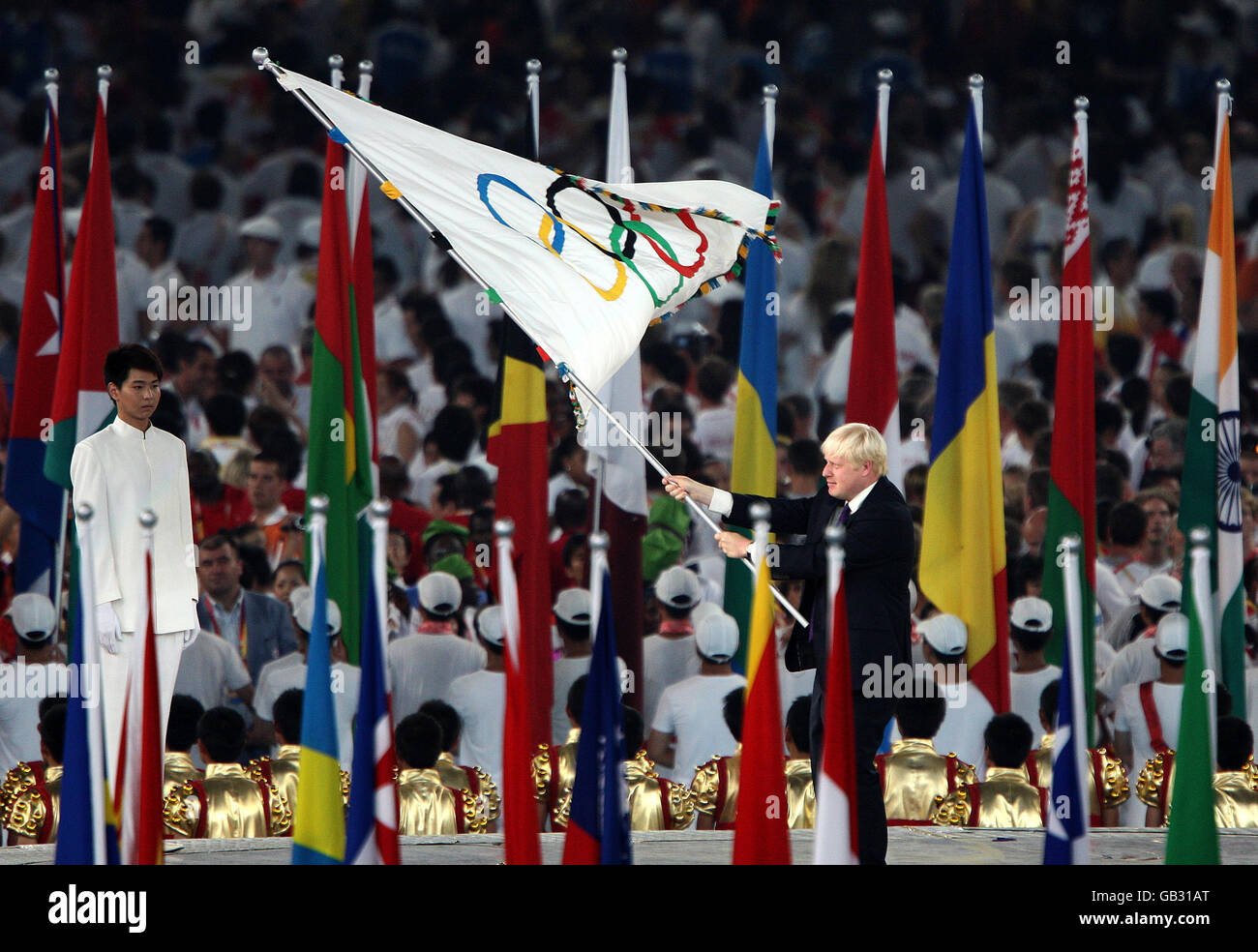 Lord Mayor of London Boris Johnson waves the Olympic flag during the ...