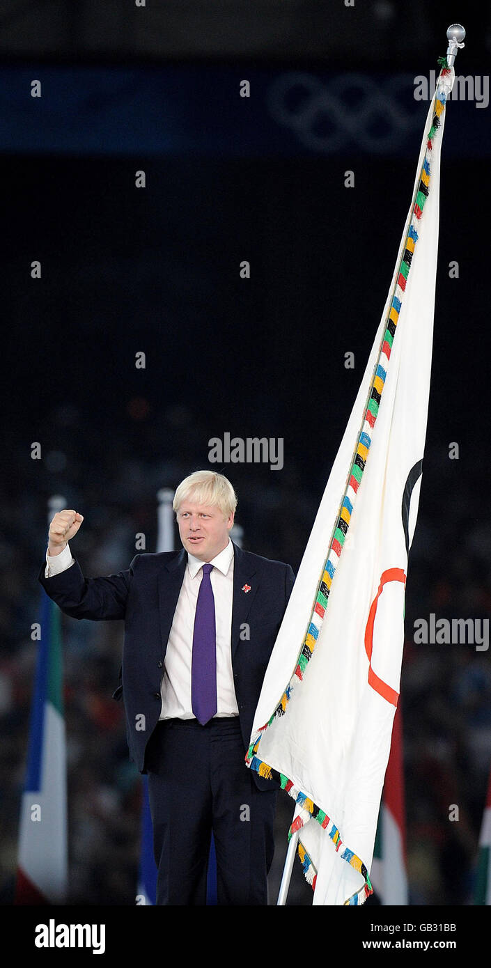 Mayor of London Boris Johnson clenches his fist after waving the ...
